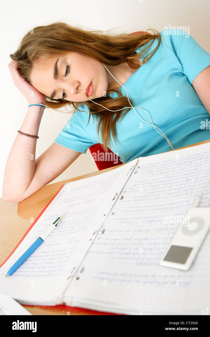TEENAGER DOING HOMEWORK Stock Photo - Alamy