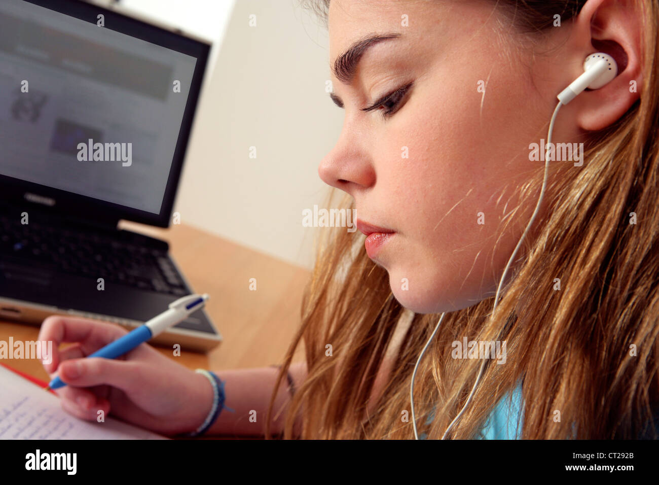 TEENAGER DOING HOMEWORK Stock Photo - Alamy