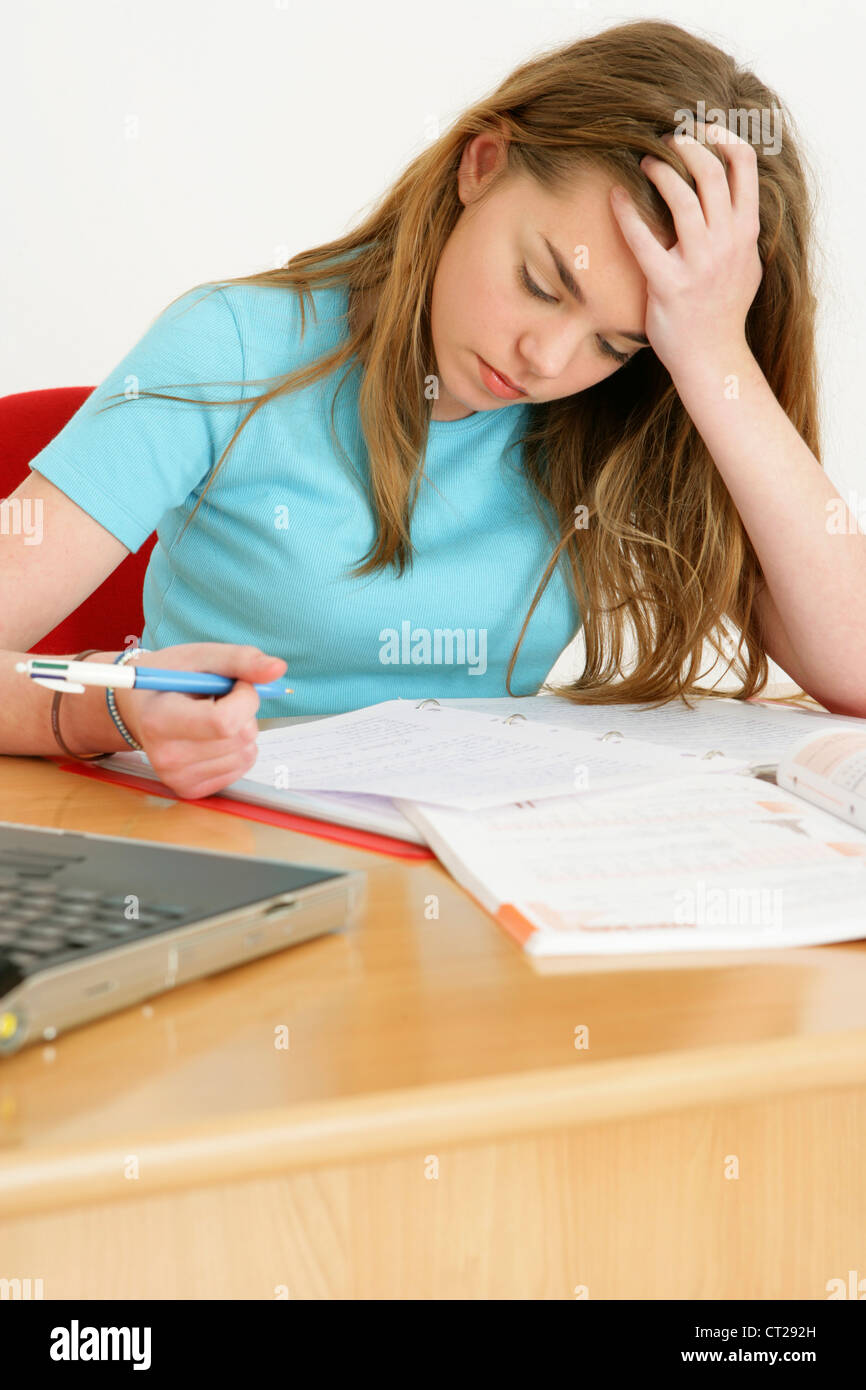 TEENAGER DOING HOMEWORK Stock Photo - Alamy