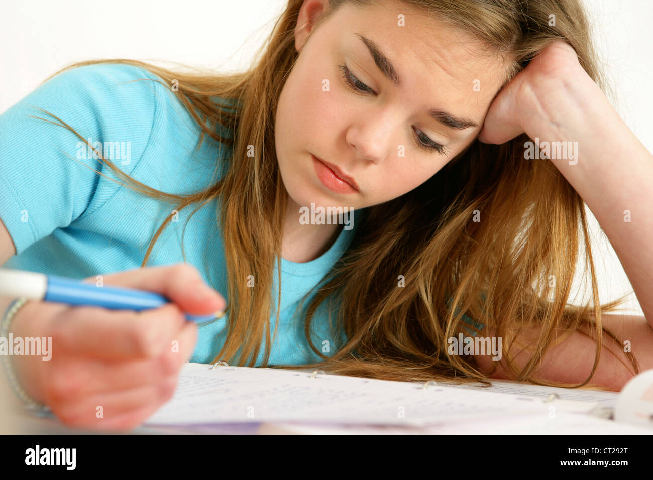 TEENAGER DOING HOMEWORK Stock Photo - Alamy