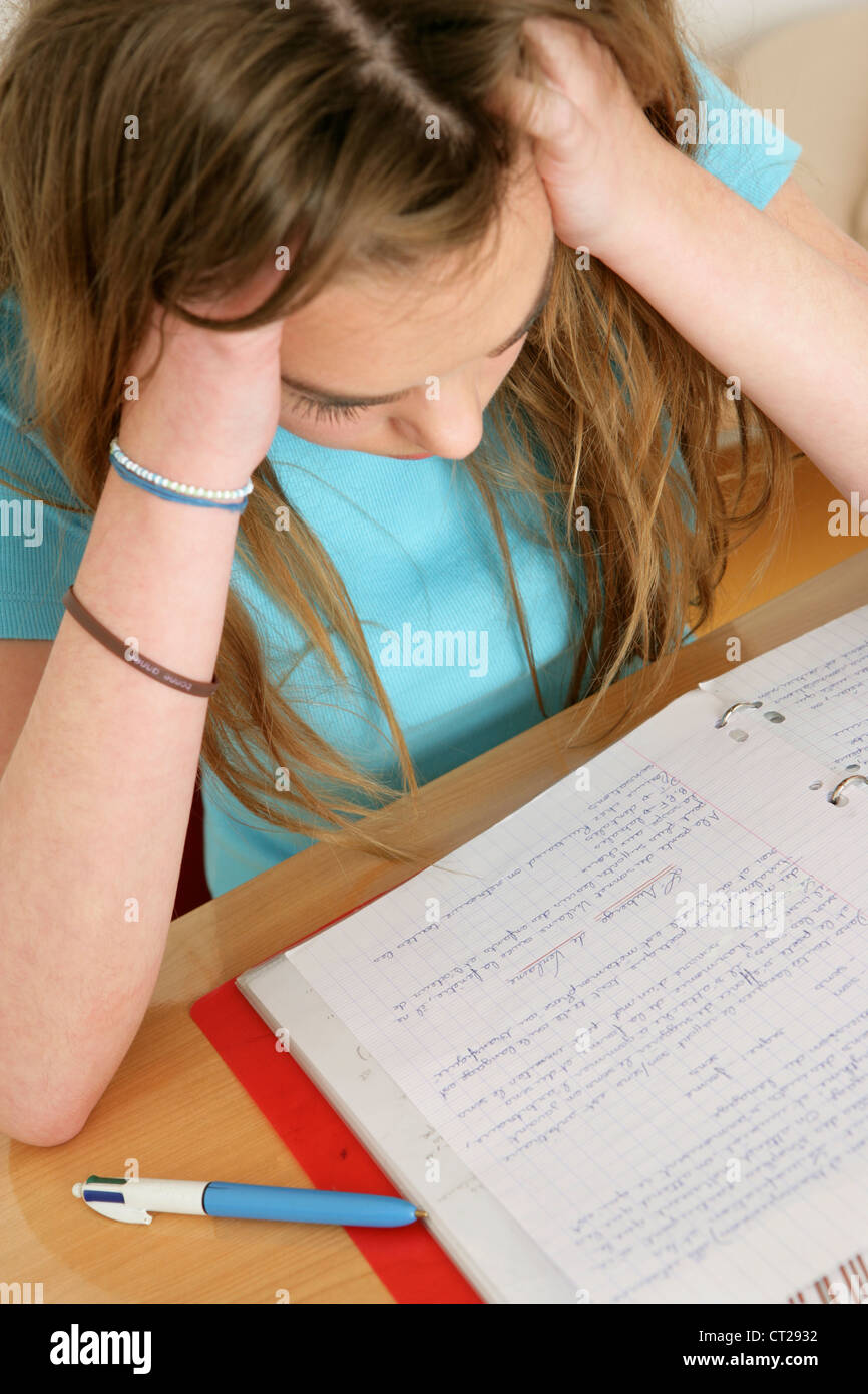 TEENAGER DOING HOMEWORK Stock Photo - Alamy