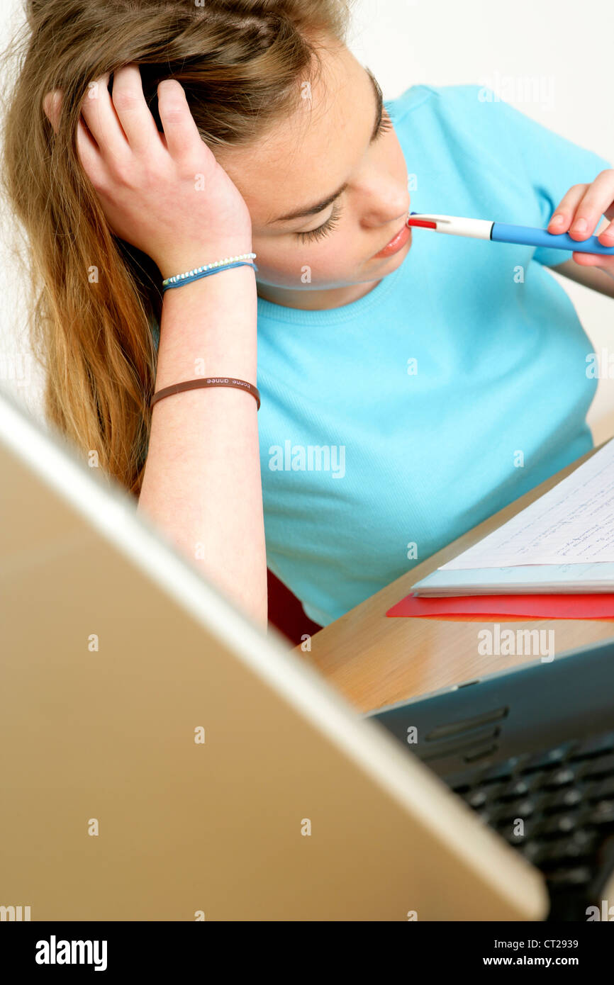 TEENAGER DOING HOMEWORK Stock Photo - Alamy