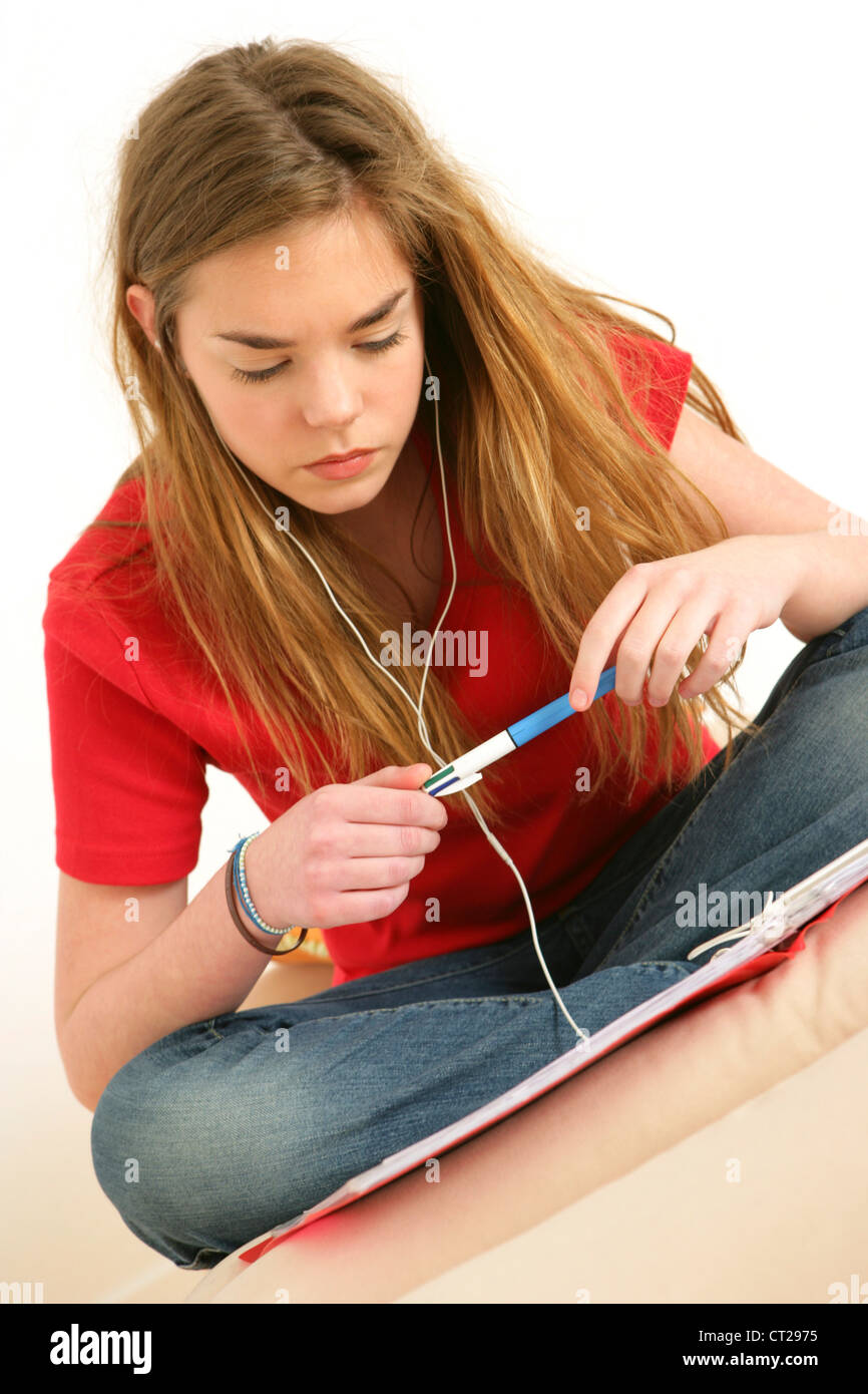TEENAGER DOING HOMEWORK Stock Photo - Alamy