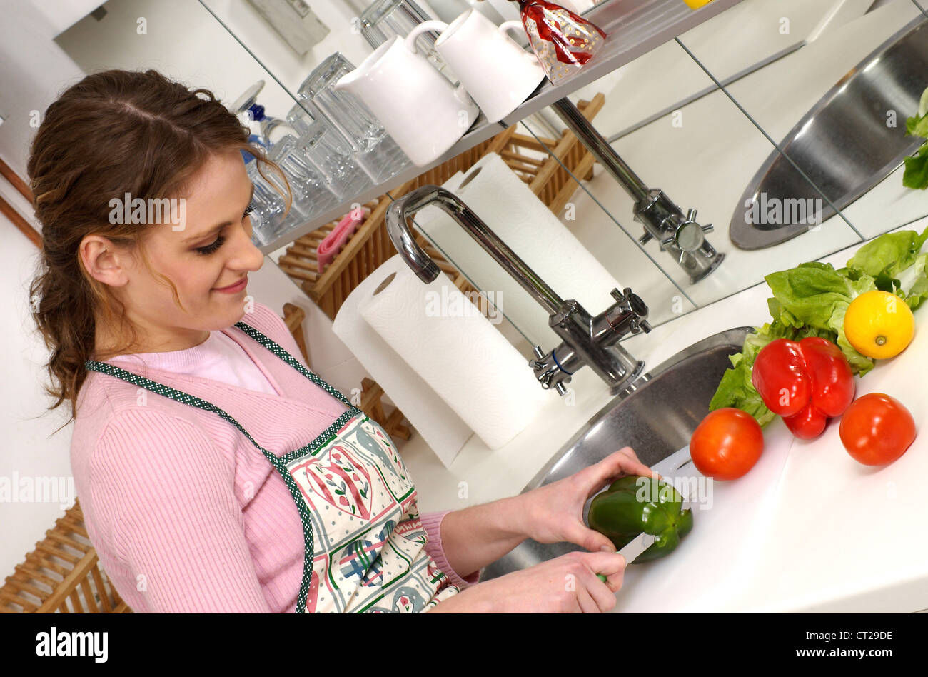 WOMAN IN KITCHEN Stock Photo - Alamy