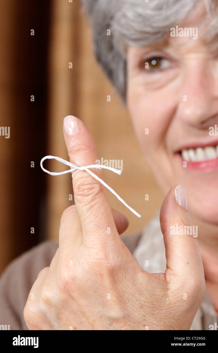 Elderly memory string hi-res stock photography and images - Alamy