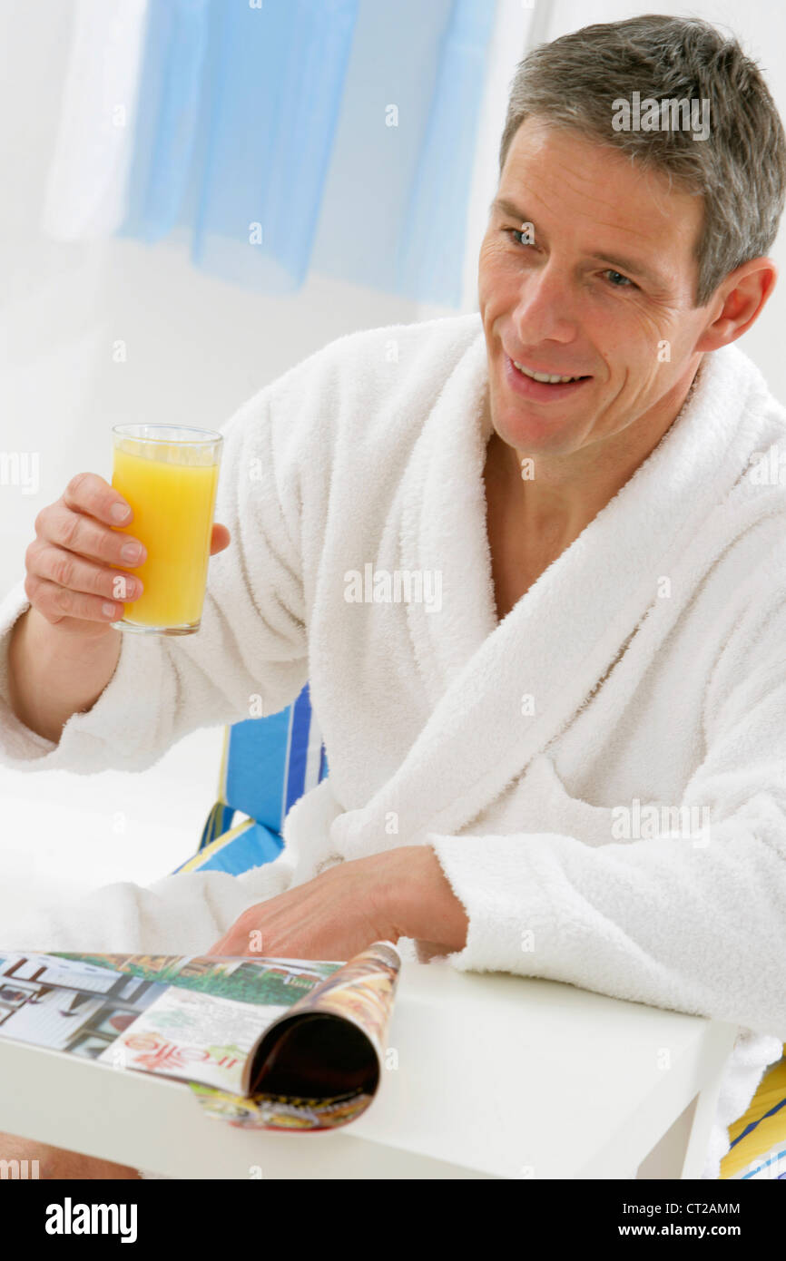 MAN WITH COLD DRINK Stock Photo - Alamy