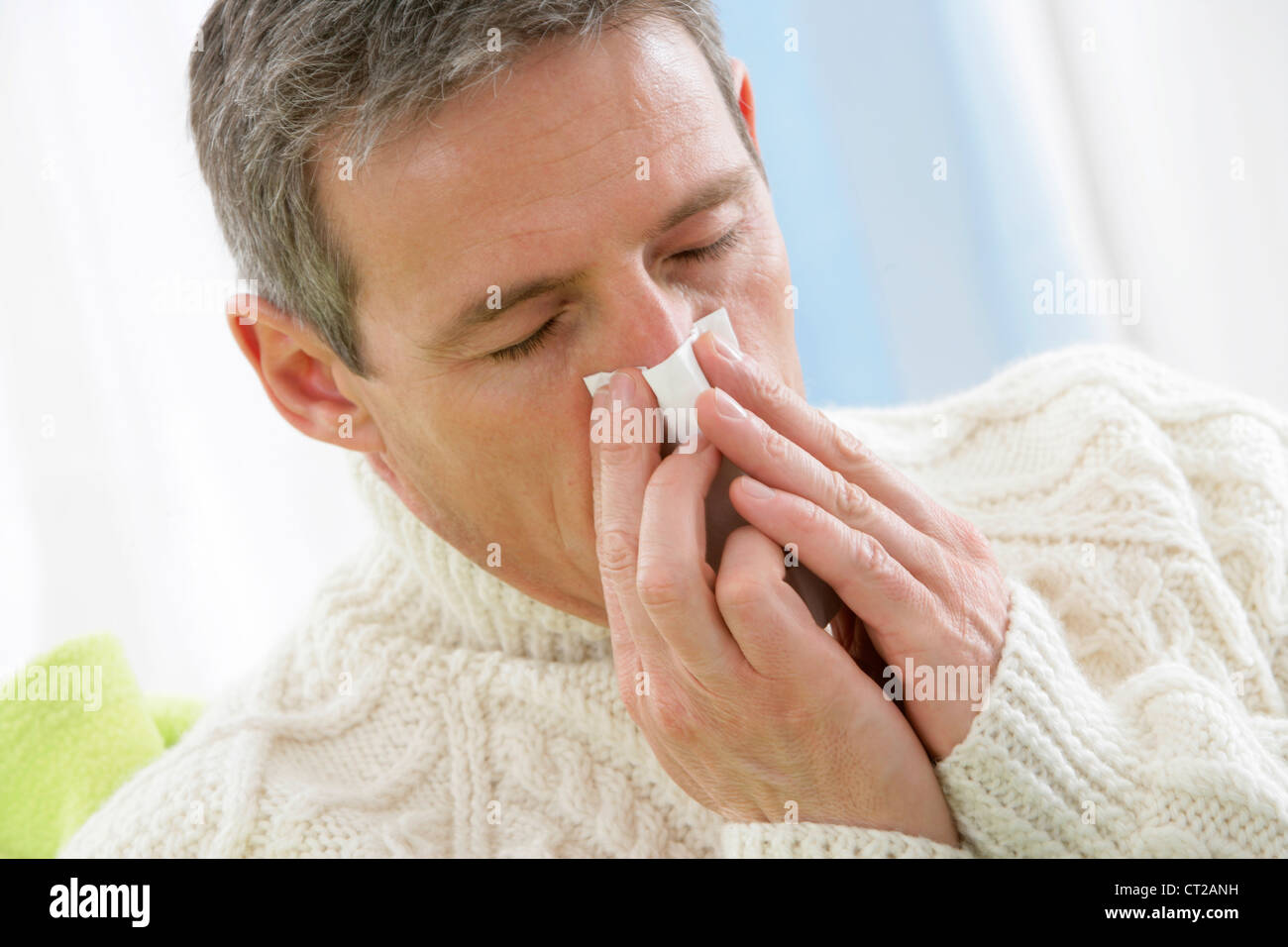 MAN WITH RHINITIS Stock Photo - Alamy