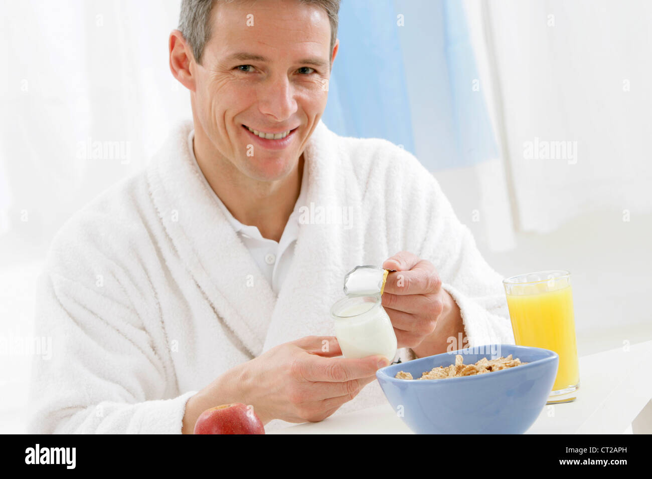 MAN EATING BREAKFAST Stock Photo - Alamy