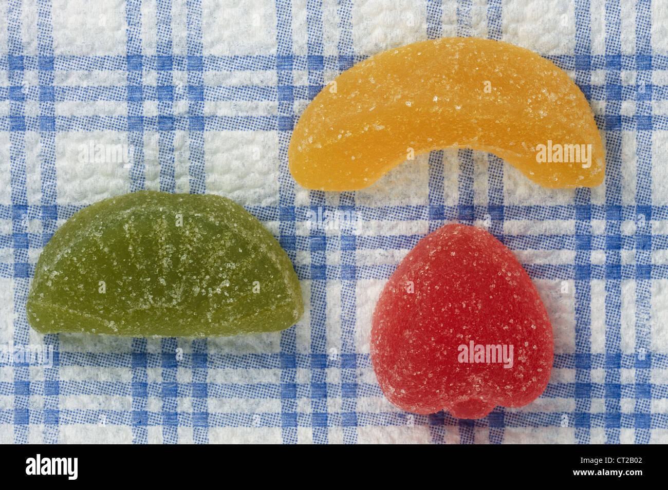 Colored gelatin desserts sprinkled with sugar. Gelatin mixed with fruit ...