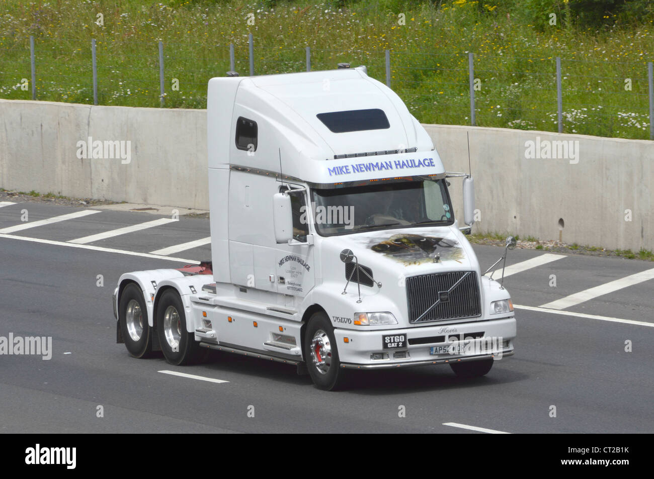 Volvo tractor unit without trailer on UK motorway with streamlined top ...