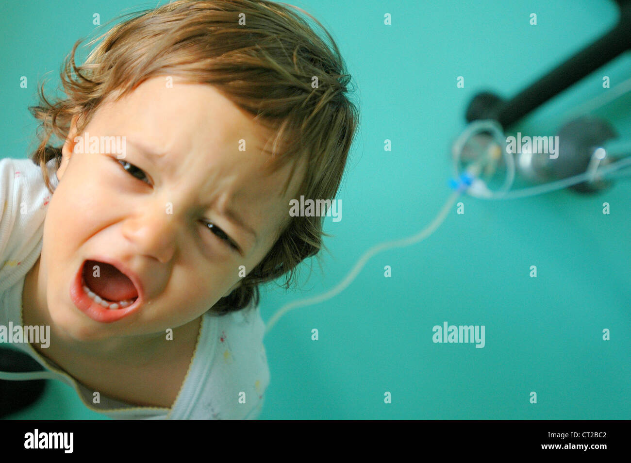 CHILD WITH A DRIP Stock Photo - Alamy
