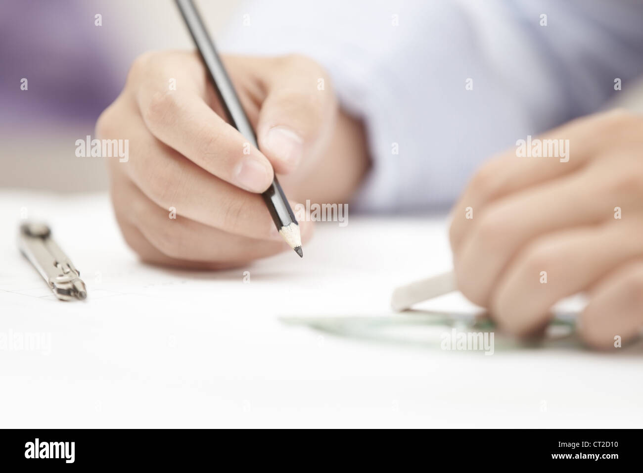 Hand of engineer drawing by pencil Stock Photo - Alamy