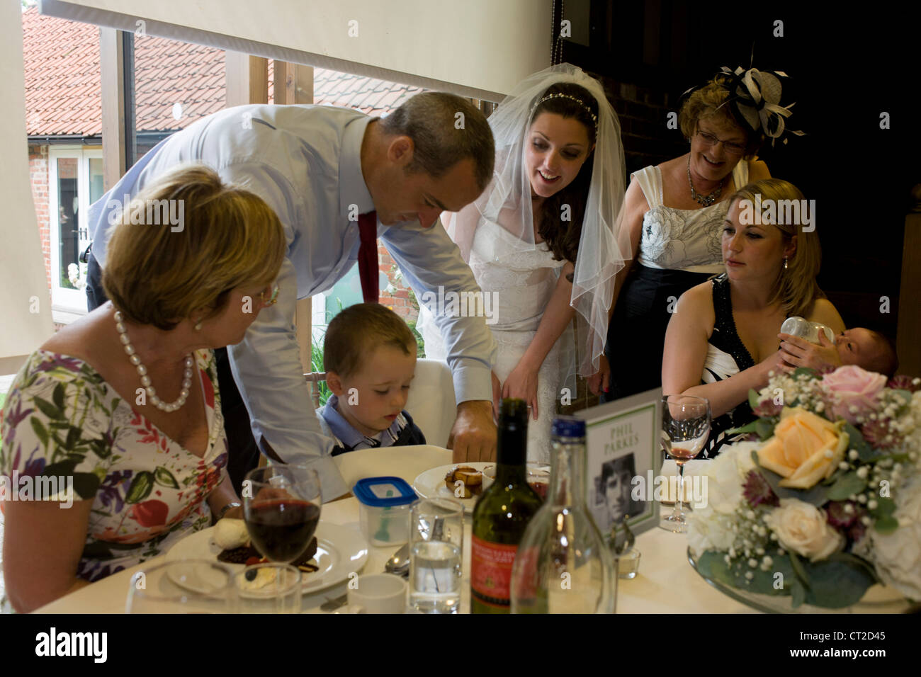 Coaxing hi-res stock photography and images - Alamy