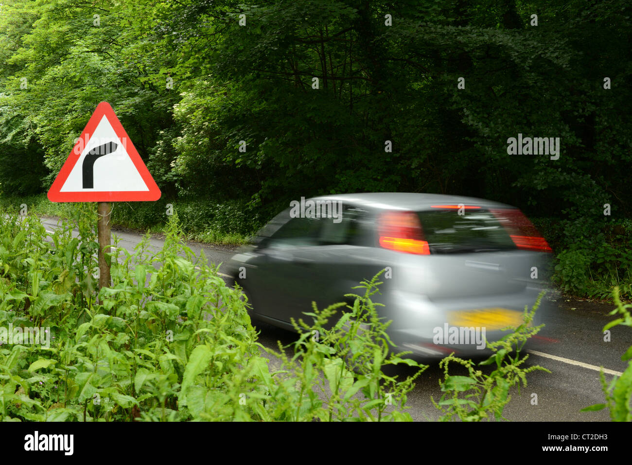 Sharp bend road sign hi-res stock photography and images - Alamy