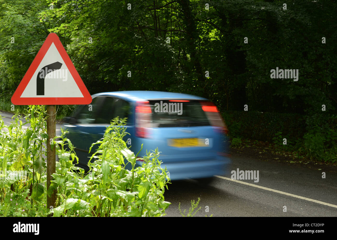 Sharp bend road sign hi-res stock photography and images - Alamy