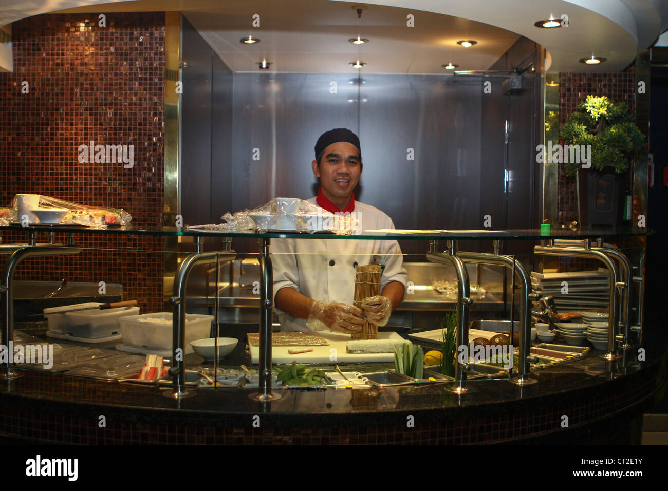 Asian Restaurant Chef prepares sushi Stock Photo - Alamy