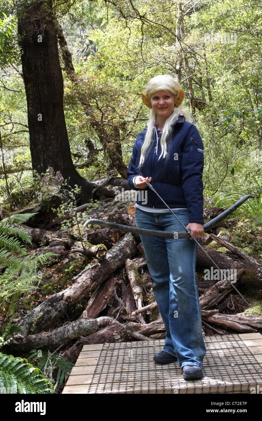 Elf with bow and arrow Stock Photo - Alamy