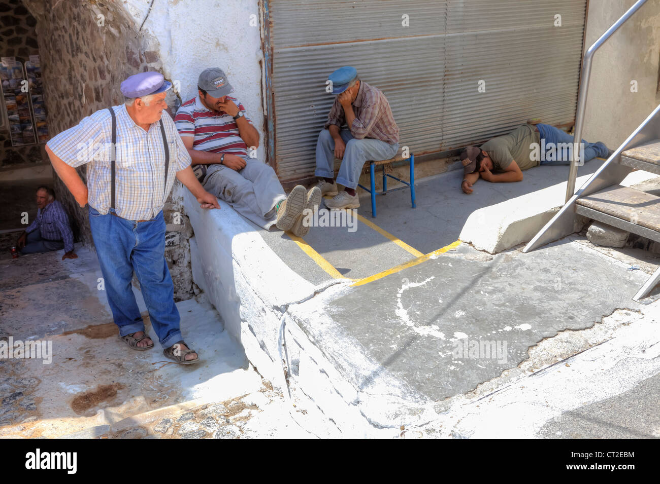 Siesta of the mule driver in the old port of Fira, Santorini, Greece ...
