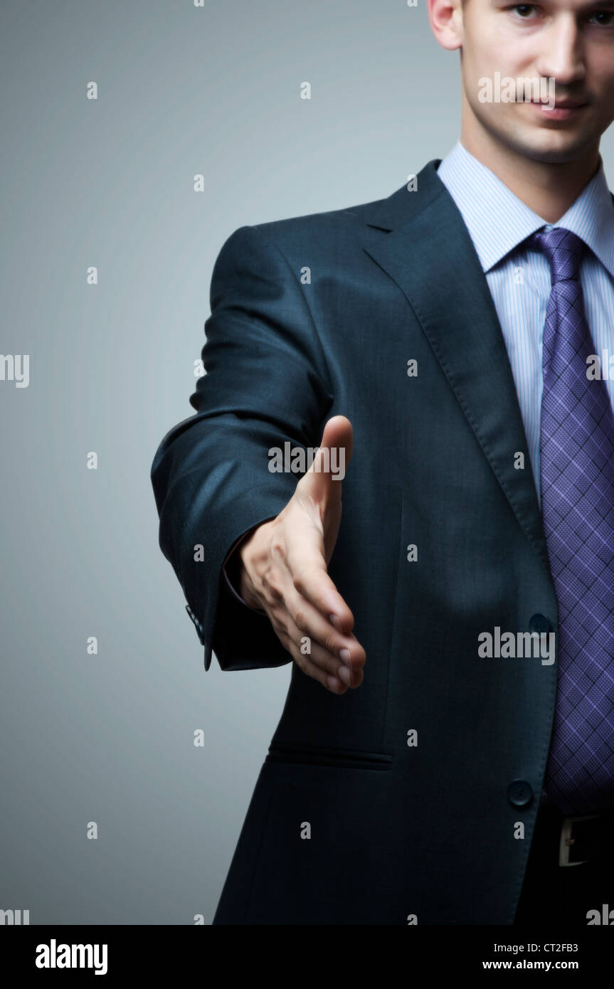 Extending hand of friendship hi-res stock photography and images - Alamy