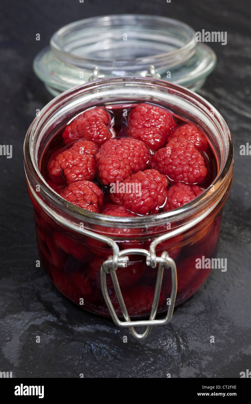 Raspberries in Glass Storage Jar Stock Photo - Alamy