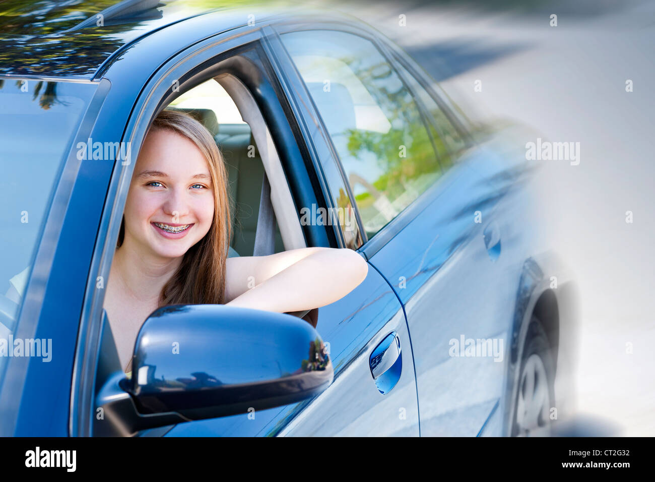 Teenage female driving student learning to drive a car Stock Photo - Alamy