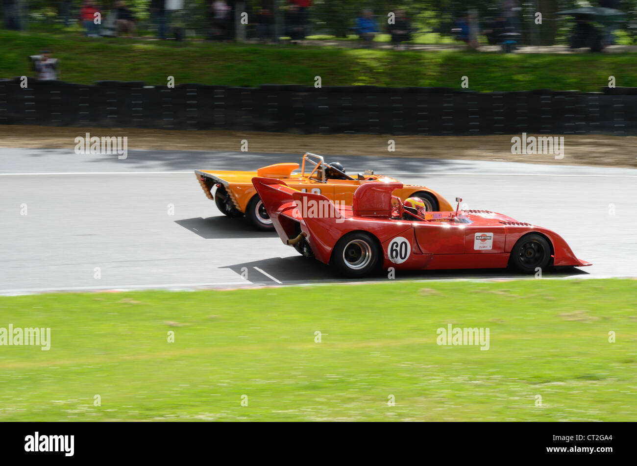 two cars racing on ciruit Stock Photo - Alamy