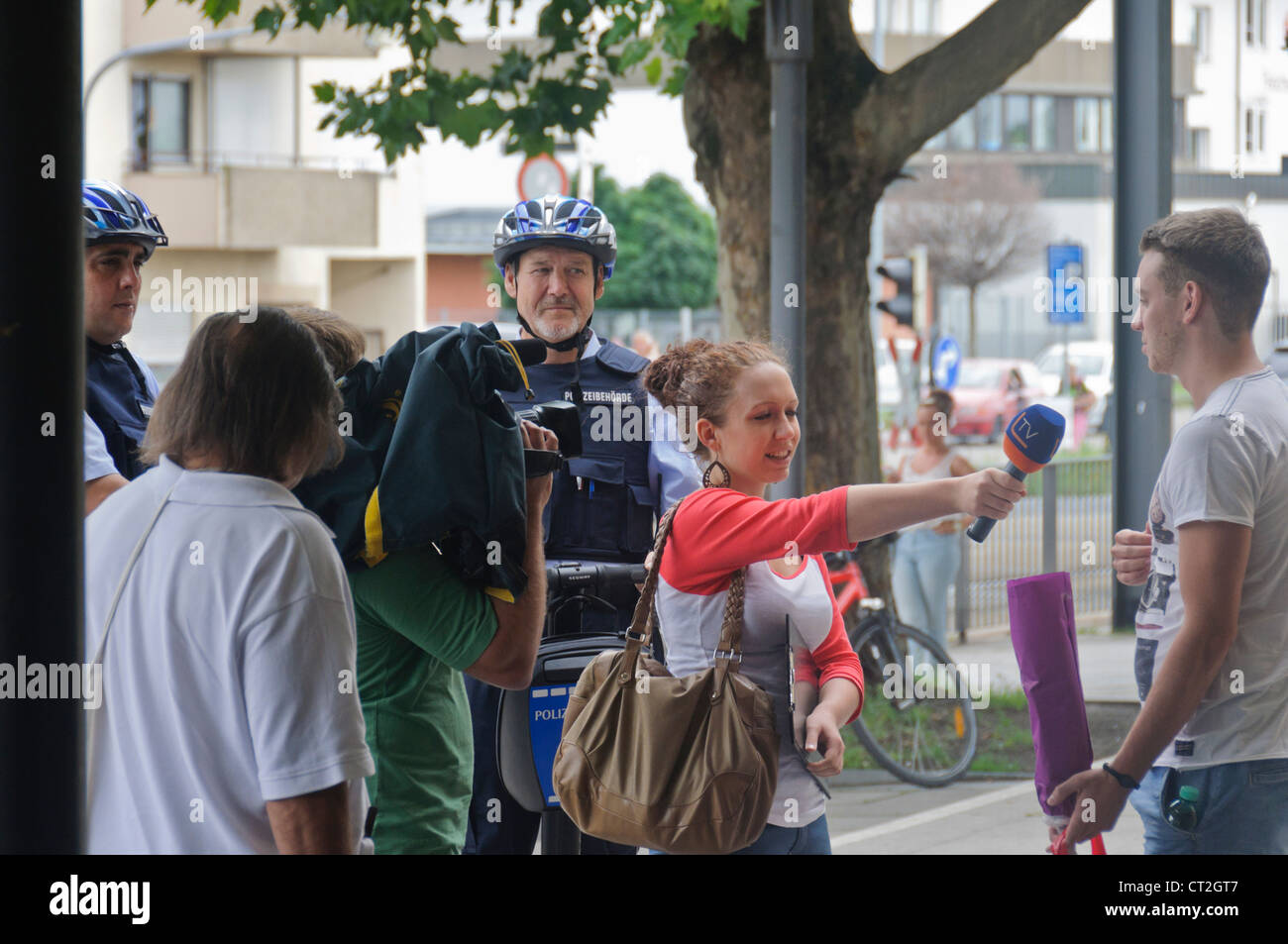 TV Team Male Cameraman Female Reporter Interview on Street with People ...