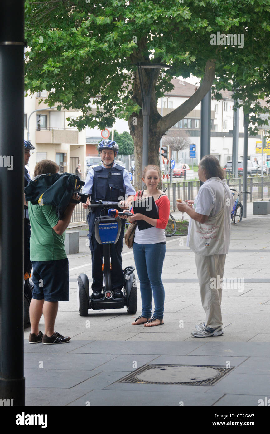 TV Team Male Cameraman Female Reporter Interview on Street with Police ...