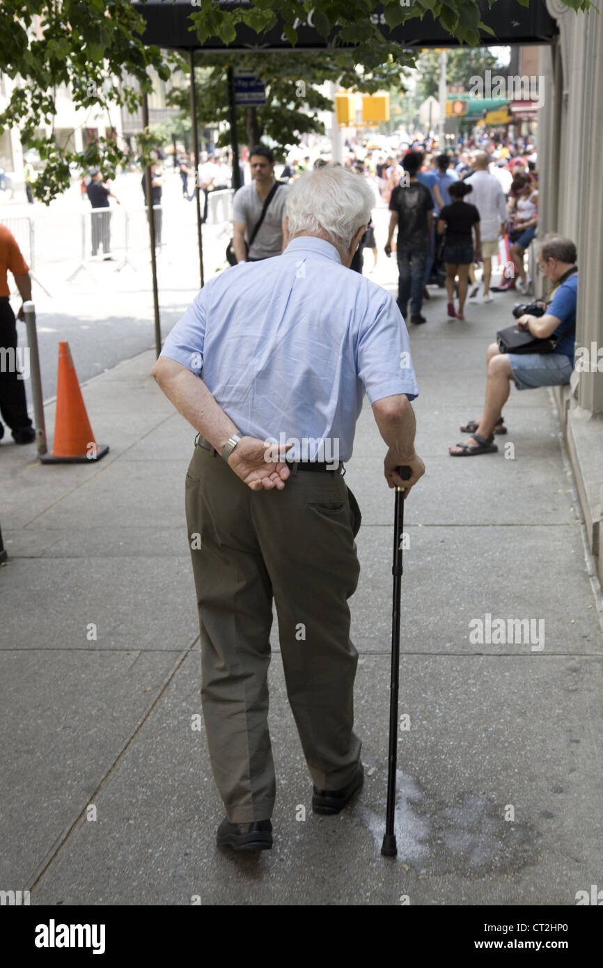 Old man walking bent hi-res stock photography and images - Alamy