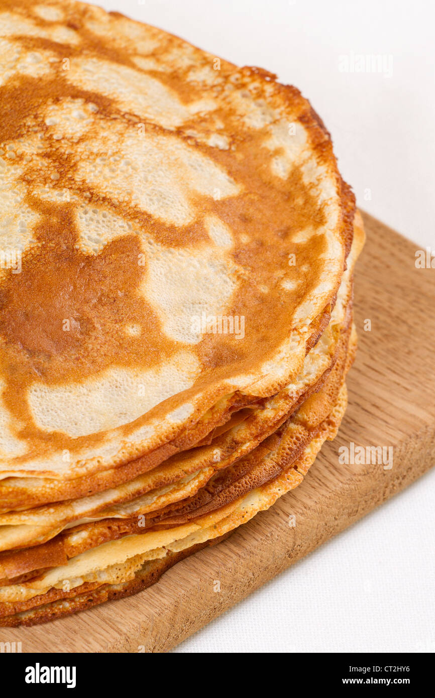 Stack of pancakes isolated on white background Stock Photo - Alamy