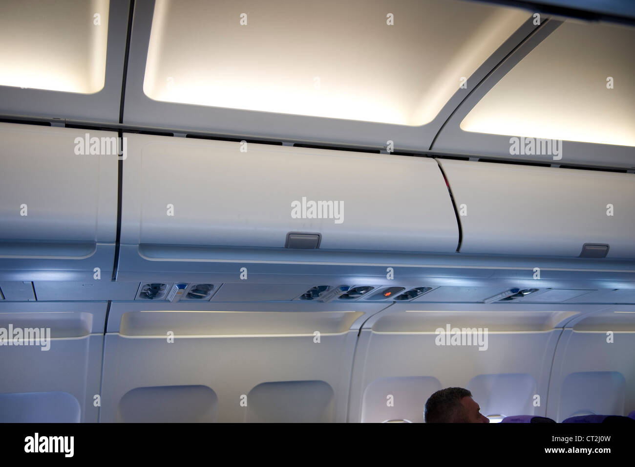 aeroplane airplane locker overhead stowage or storage Stock Photo - Alamy