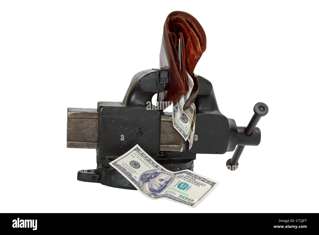 Table vise squeezing Dollars Stock Photo - Alamy
