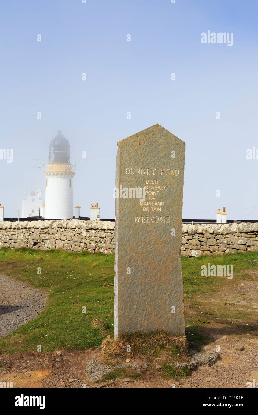 Stone welcome sign for Dunnet Head lighthouse in mist at most northerly ...