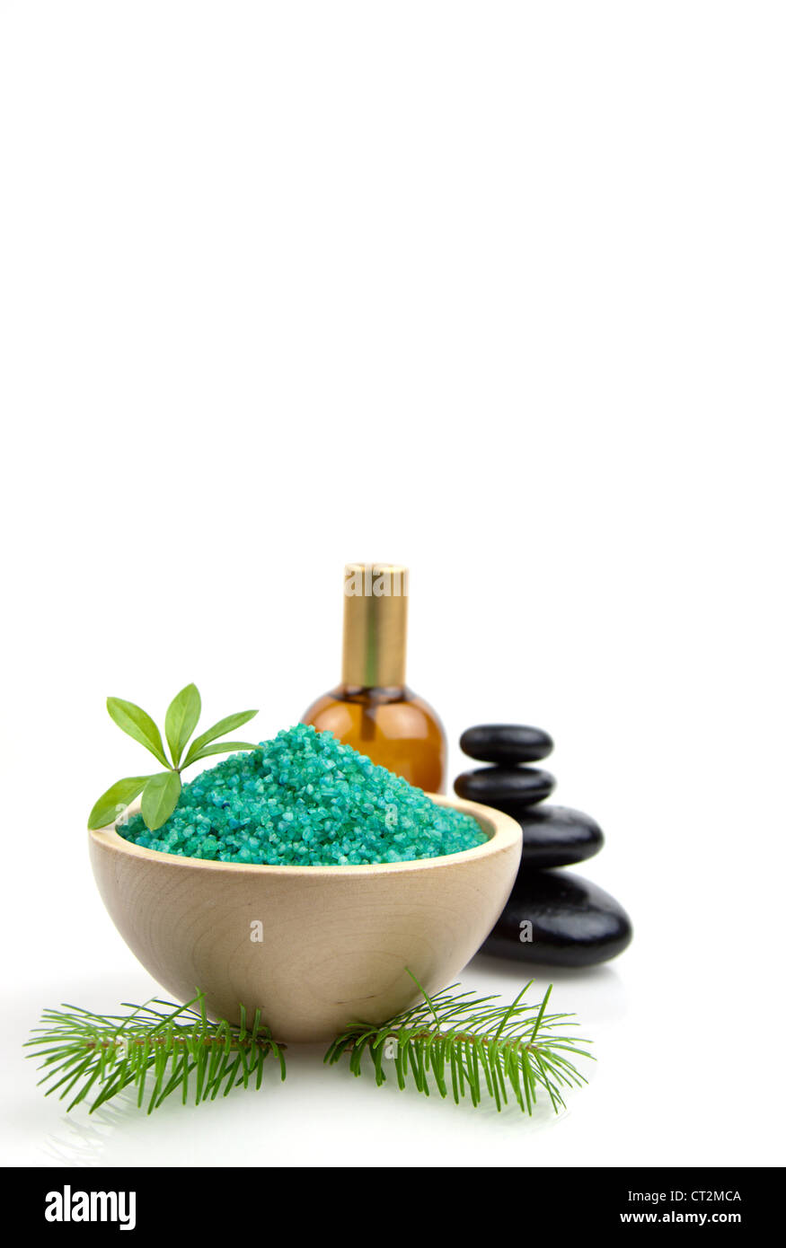 green organic salt for spa with oil on a white background Stock Photo ...