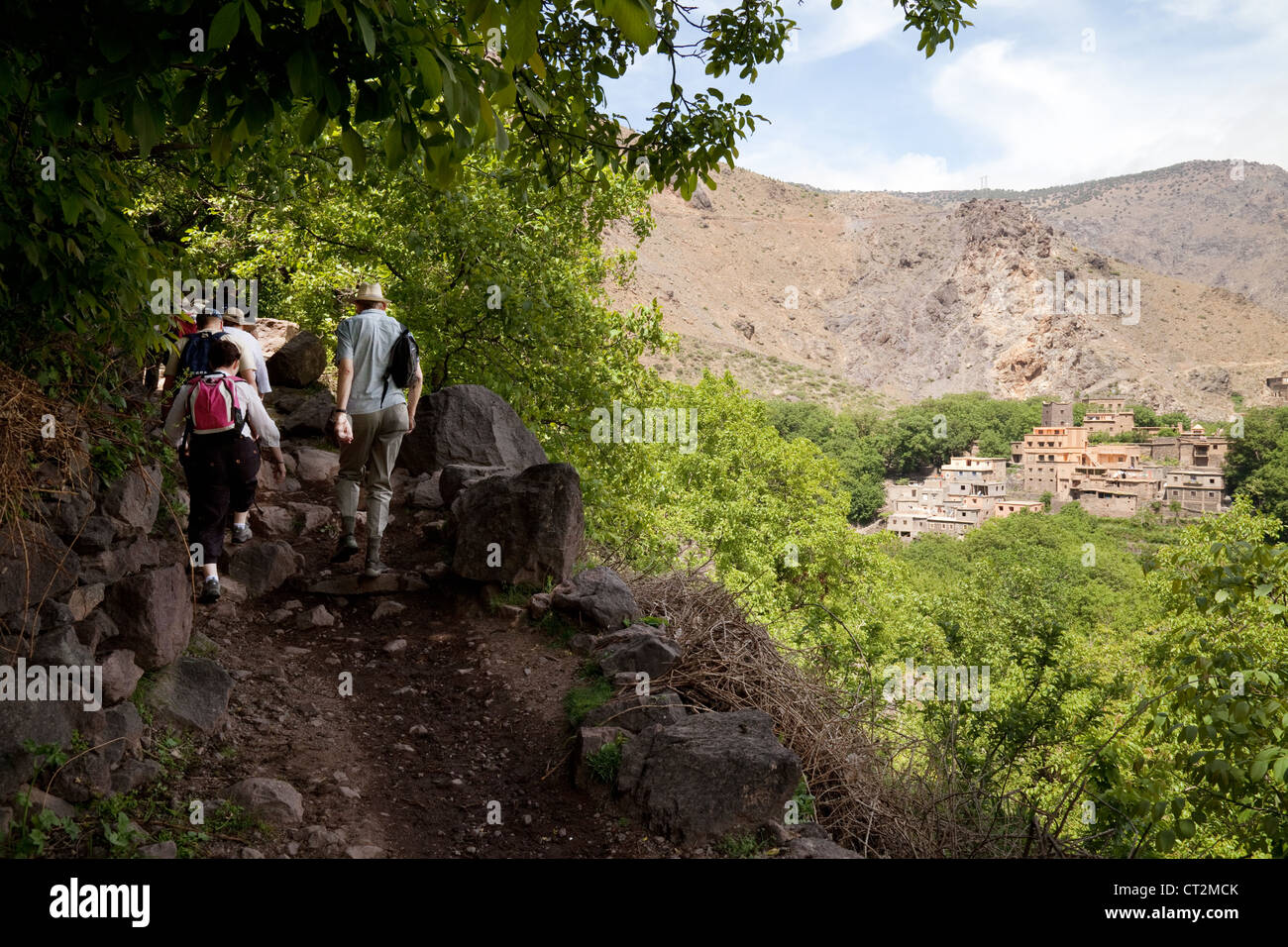Tourists walking in the HIgh Atlas mountains near Imlil, Morocco ...