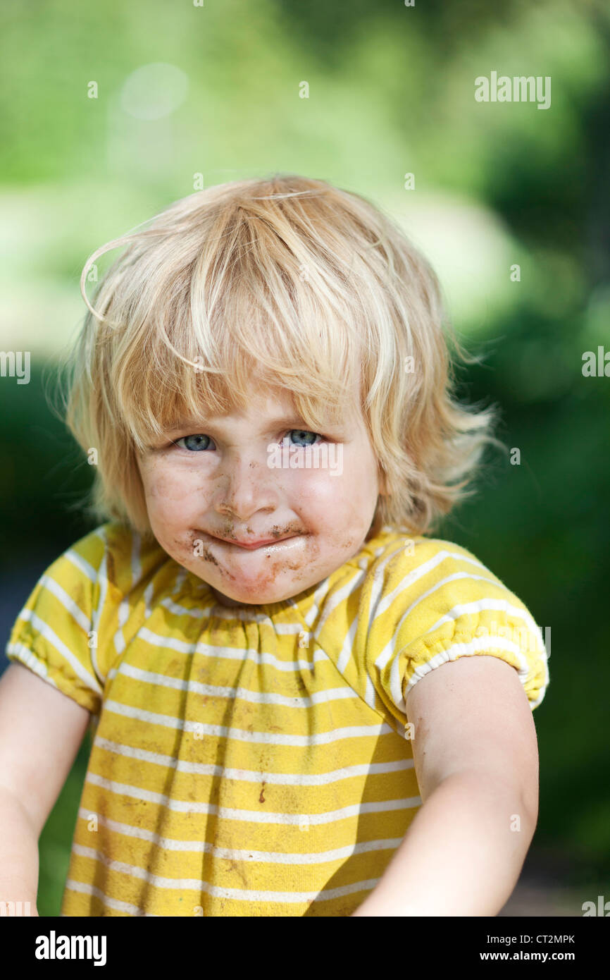 Girl with dirty face Stock Photo - Alamy
