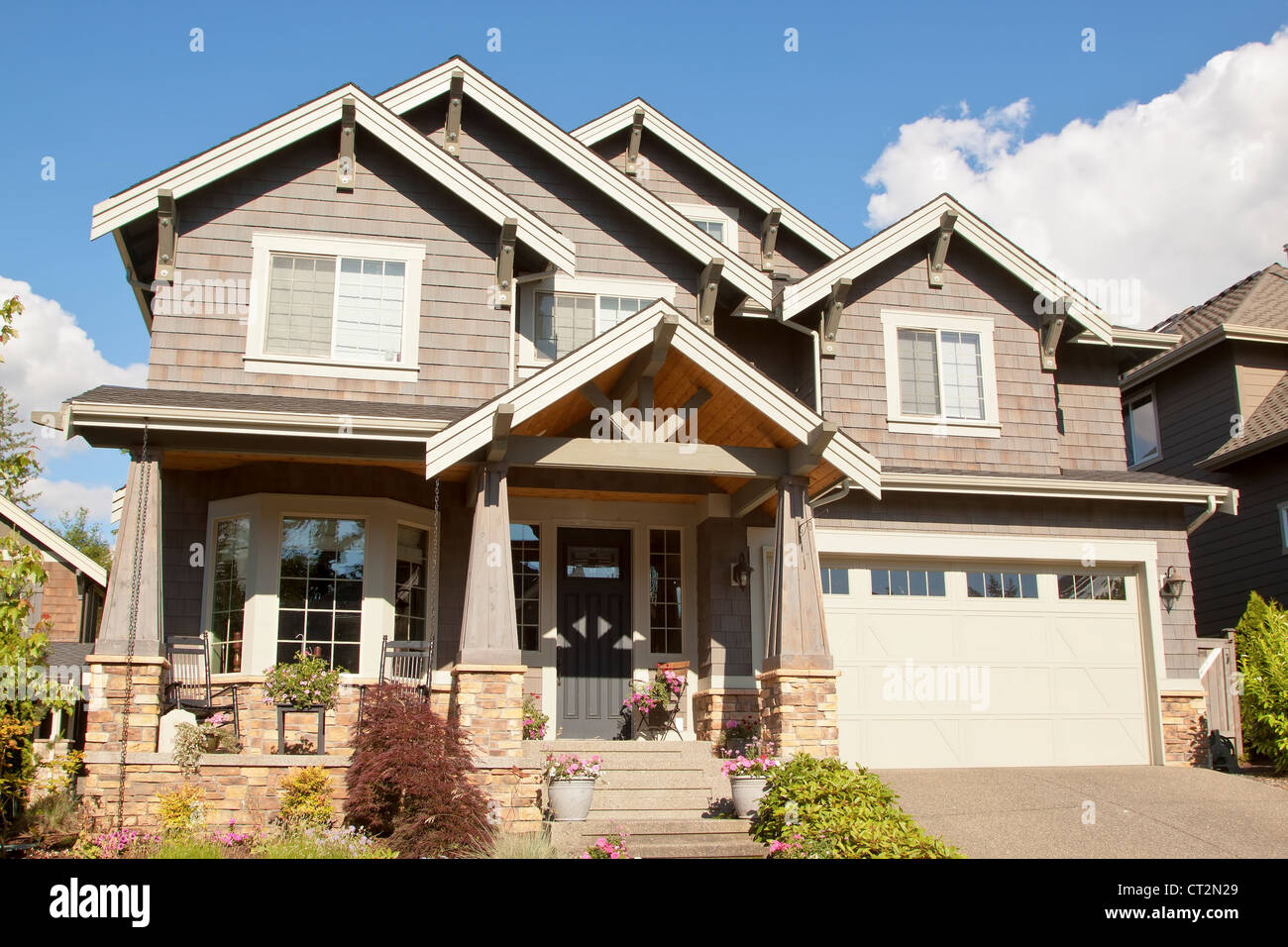 new beautiful suburban house with blue sky and clouds Stock Photo - Alamy