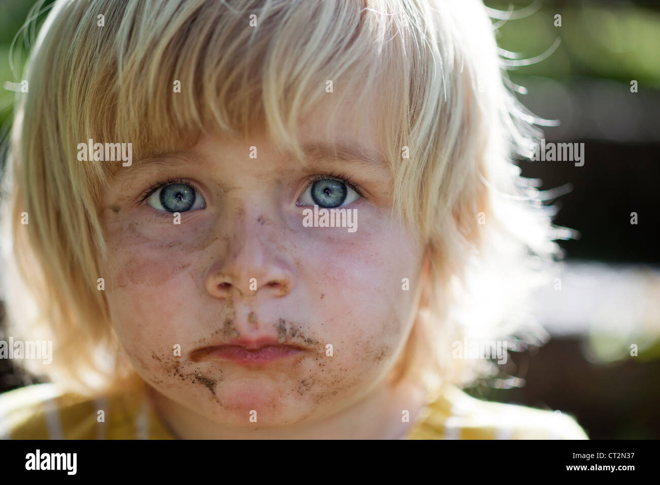 Girl with dirty face Stock Photo - Alamy
