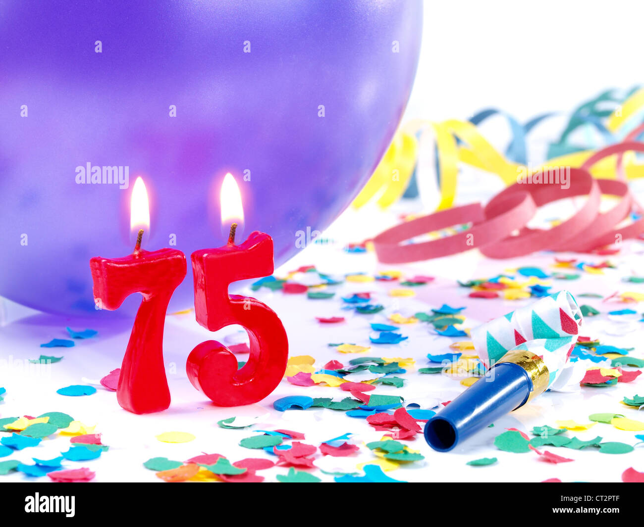 Birthday-anniversary candles showing Nr. 75 Stock Photo - Alamy
