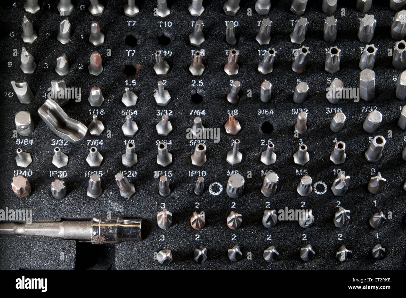 Different bits in a aluminium case photographed from the side Stock ...