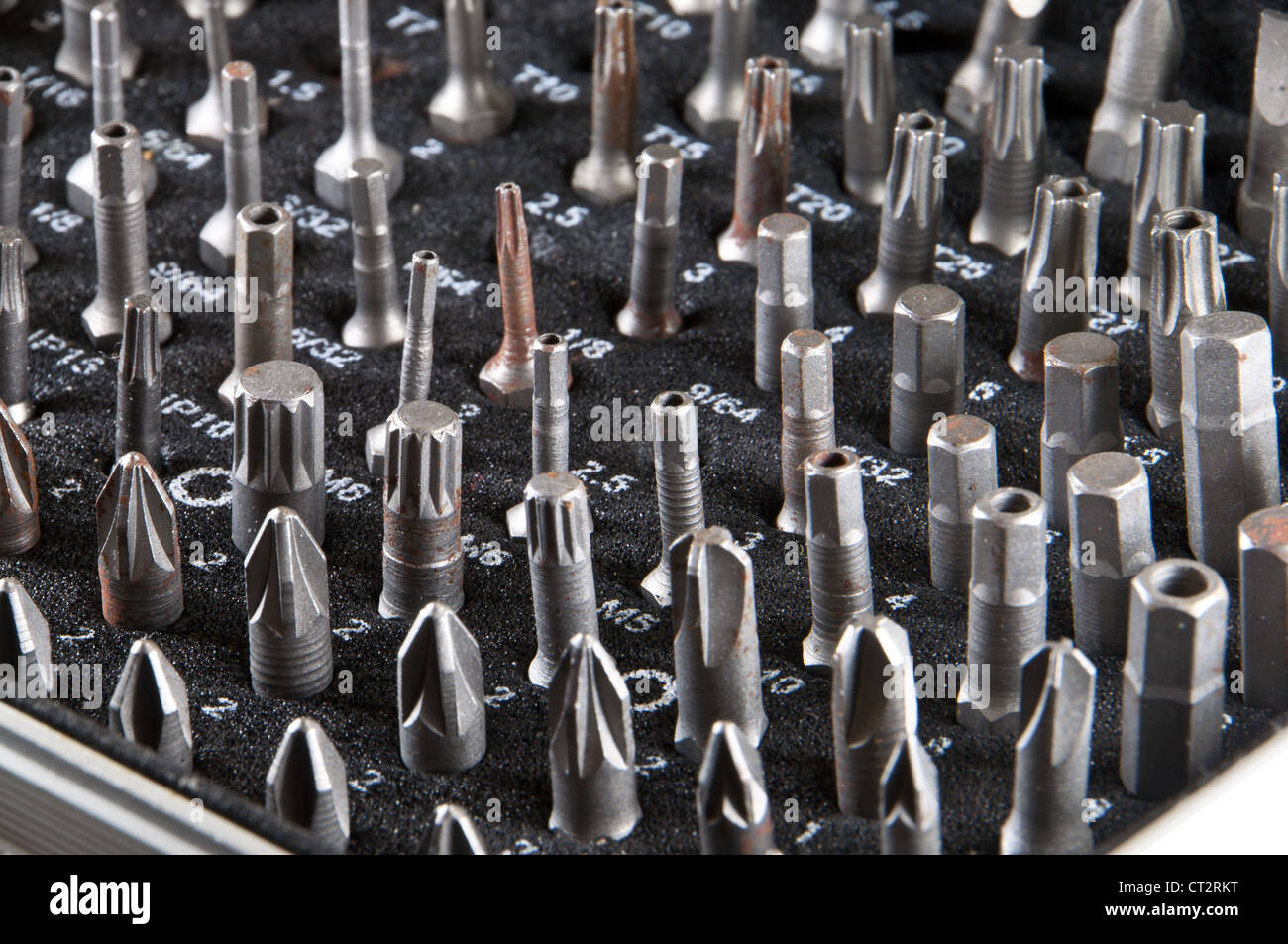 Different bits in a aluminium case photographed from the side Stock ...