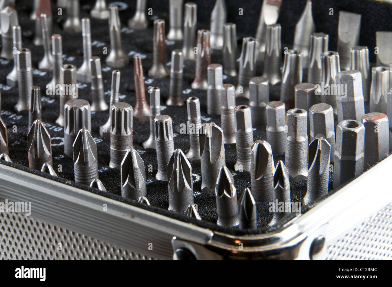 Different bits in a aluminium case photographed from the side Stock ...