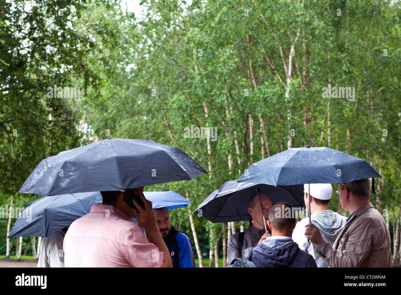 Group of People Sheltering Under Umbrellas Outside Tate Gallery Stock ...