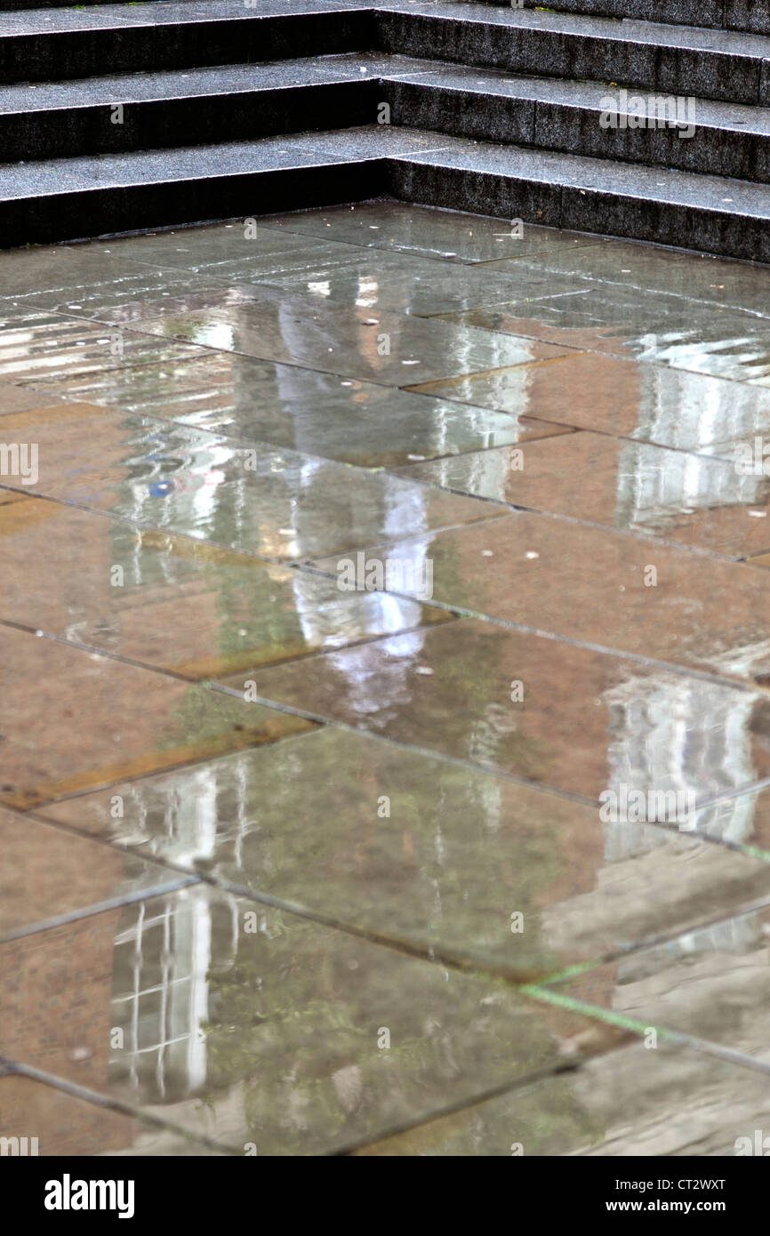 A Very Wet Summers day in London with Passers-by Reflection on Wet ...