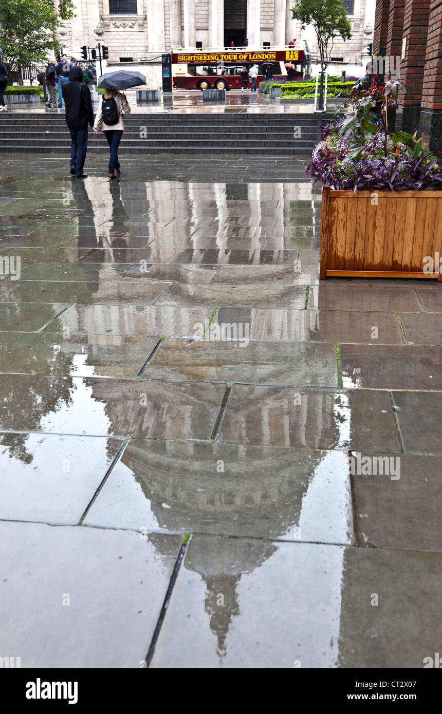 A Very Wet Summers day in London with Two People Walking in Background ...