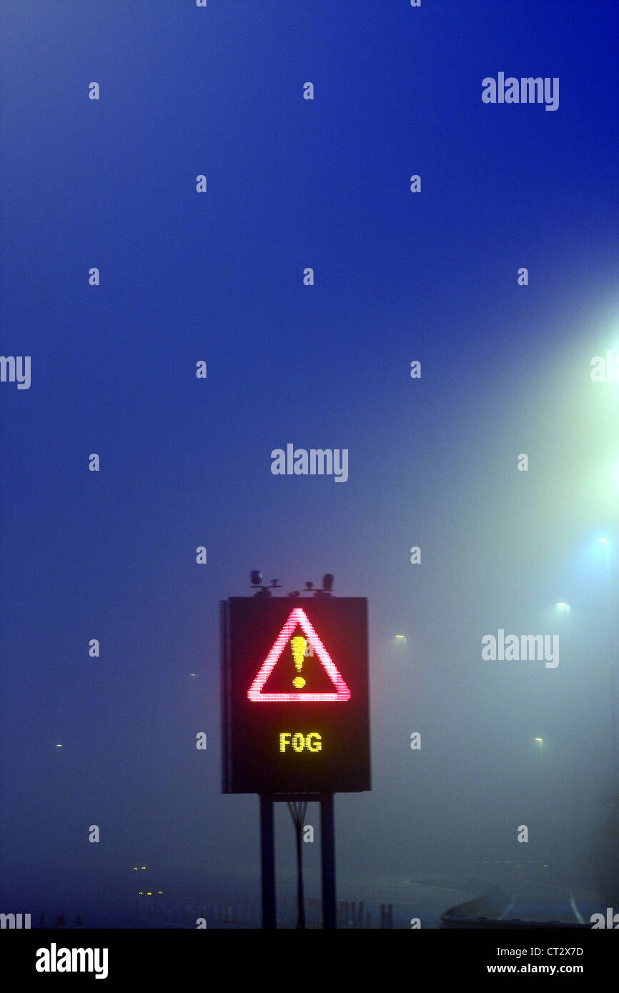 Fog sign on raod Stock Photo - Alamy