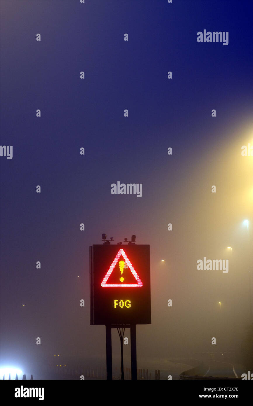 Fog sign on raod Stock Photo - Alamy