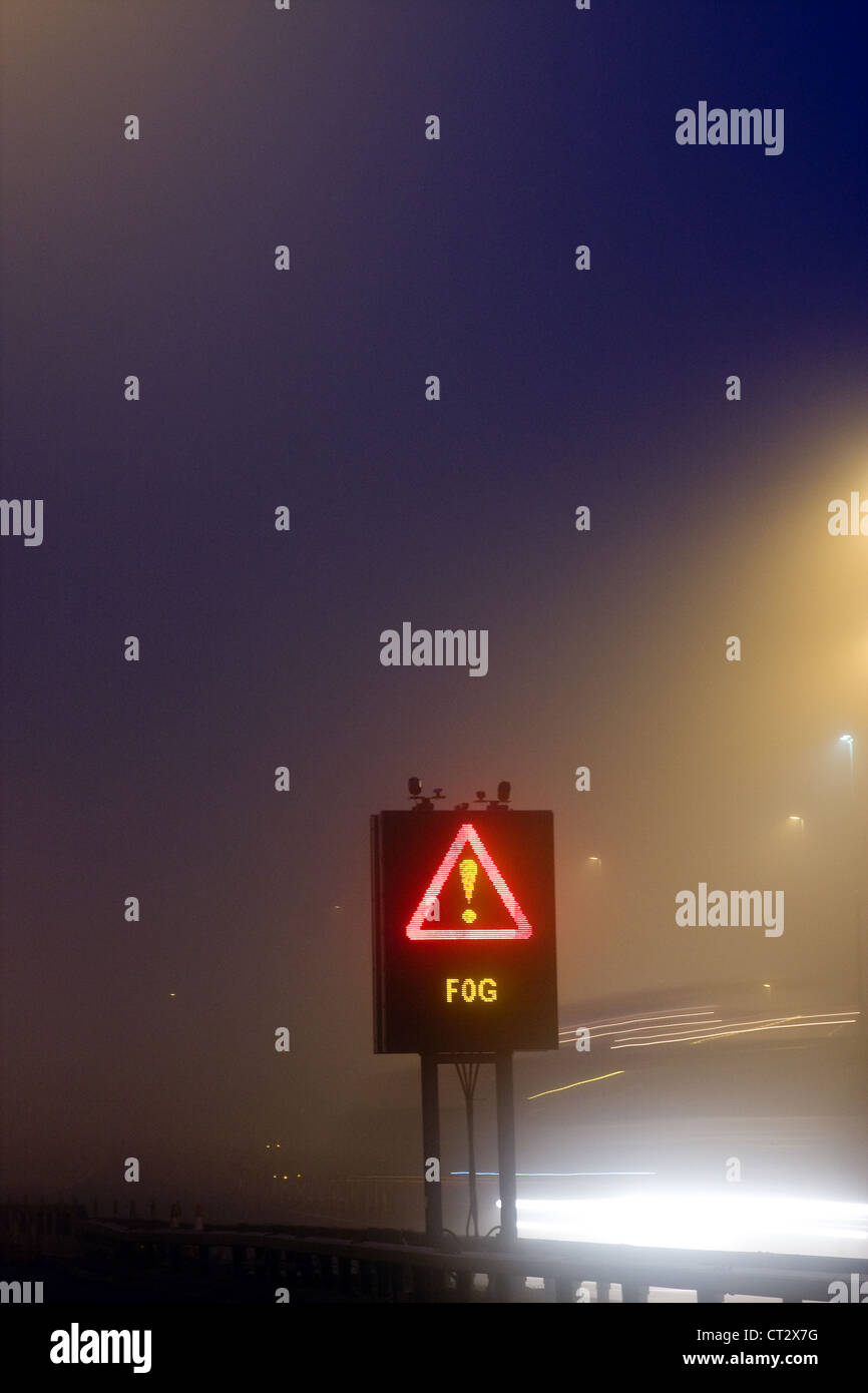 Fog sign on raod Stock Photo - Alamy