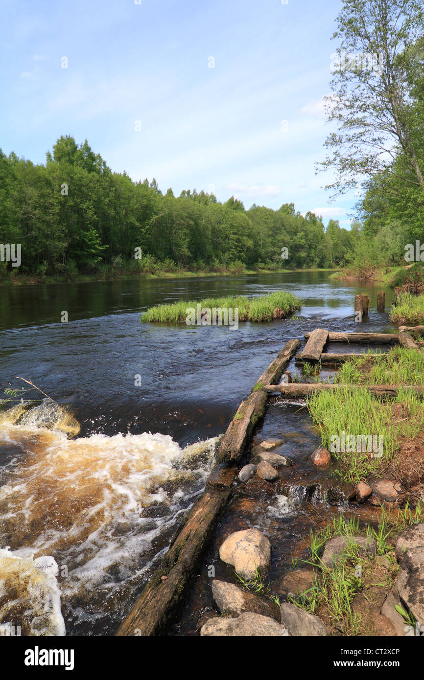 river flow on old destroyed dam Stock Photo - Alamy