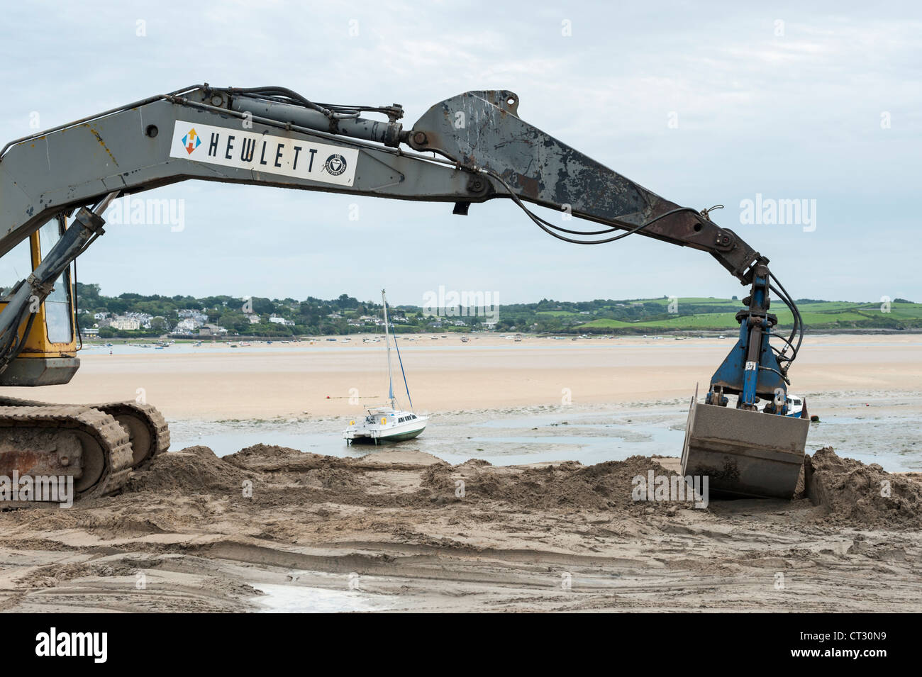 Crane at Padstow Harbour Cornwall UK used for digging out sea sand from ...